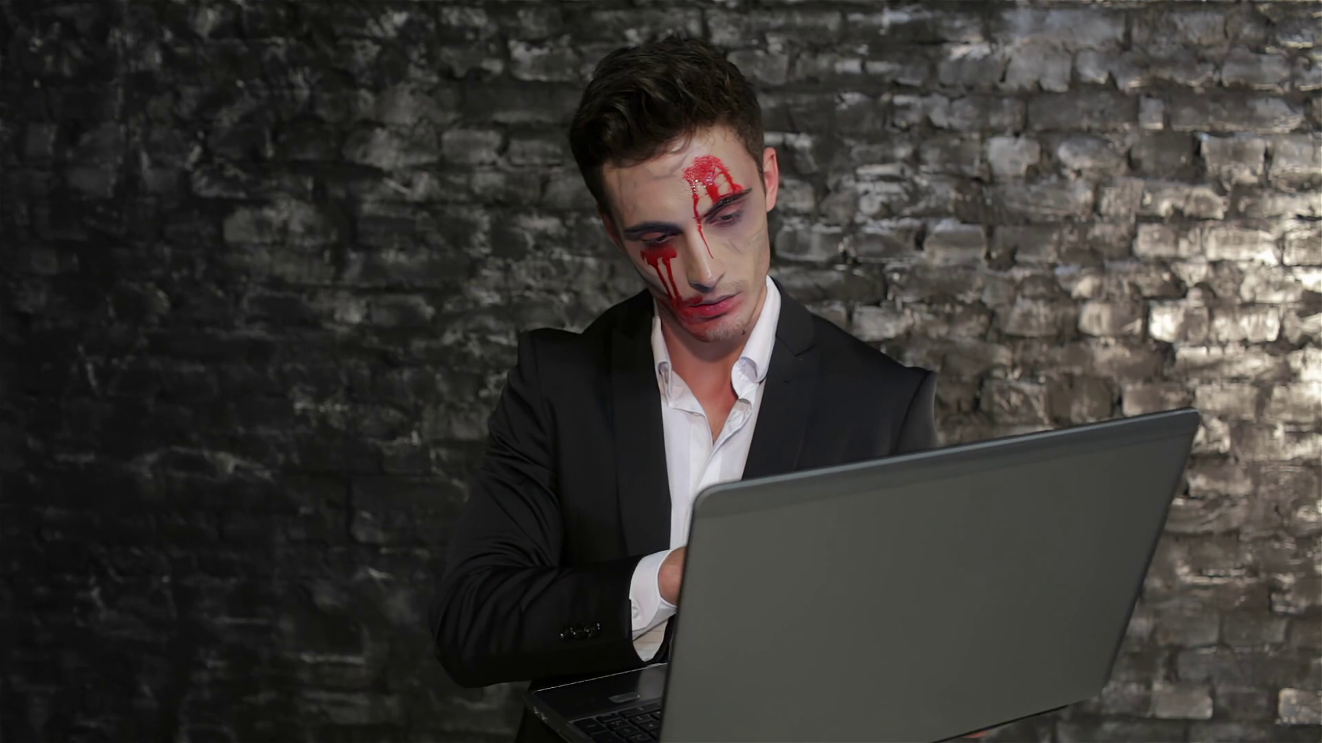 Male Vampire Uses Laptop Stock Footage SBV-348533153 - Storyblocks
