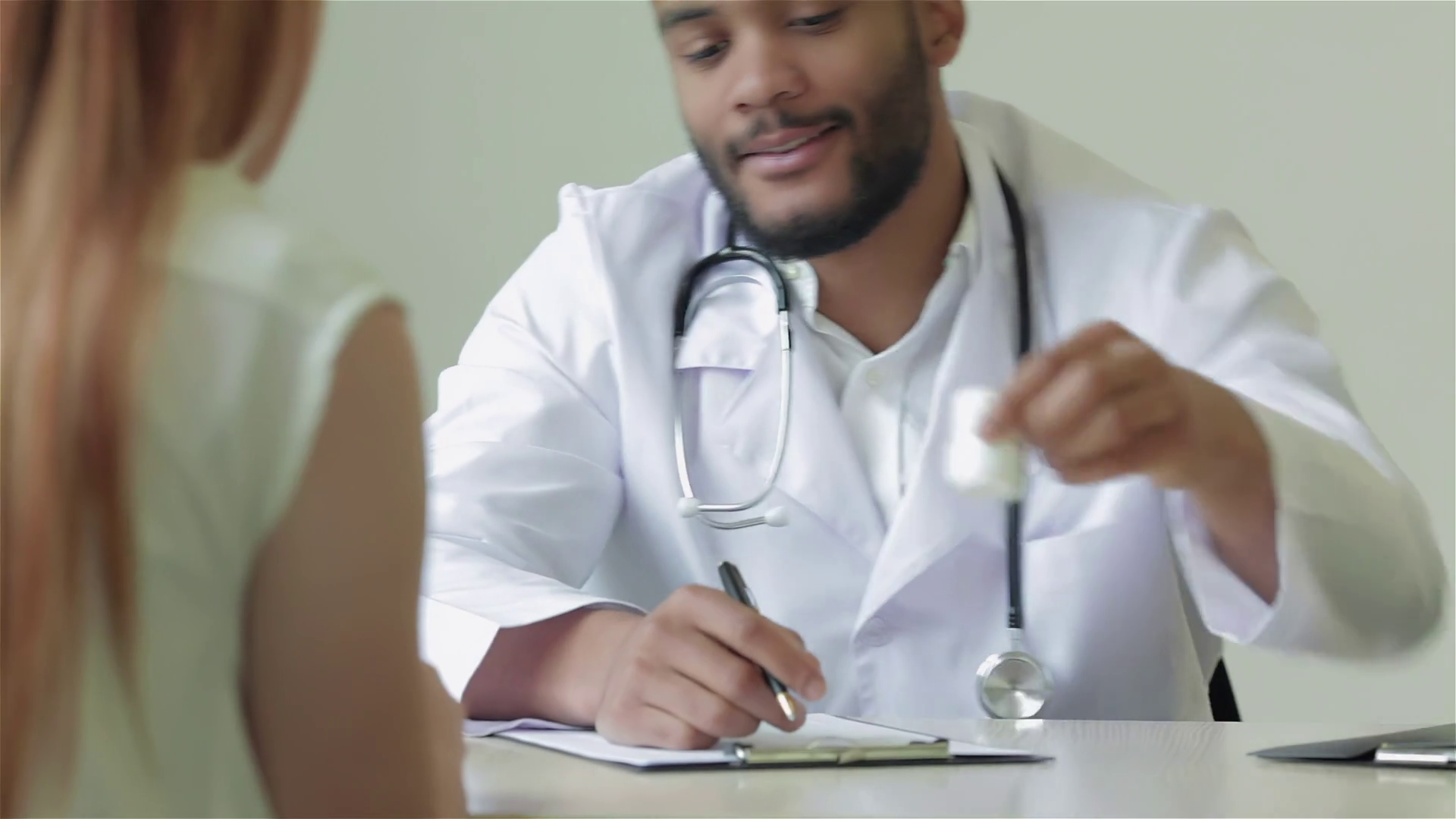 Smiling Doctor Prescribes New Drug To Patient Stock Footage SBV ...