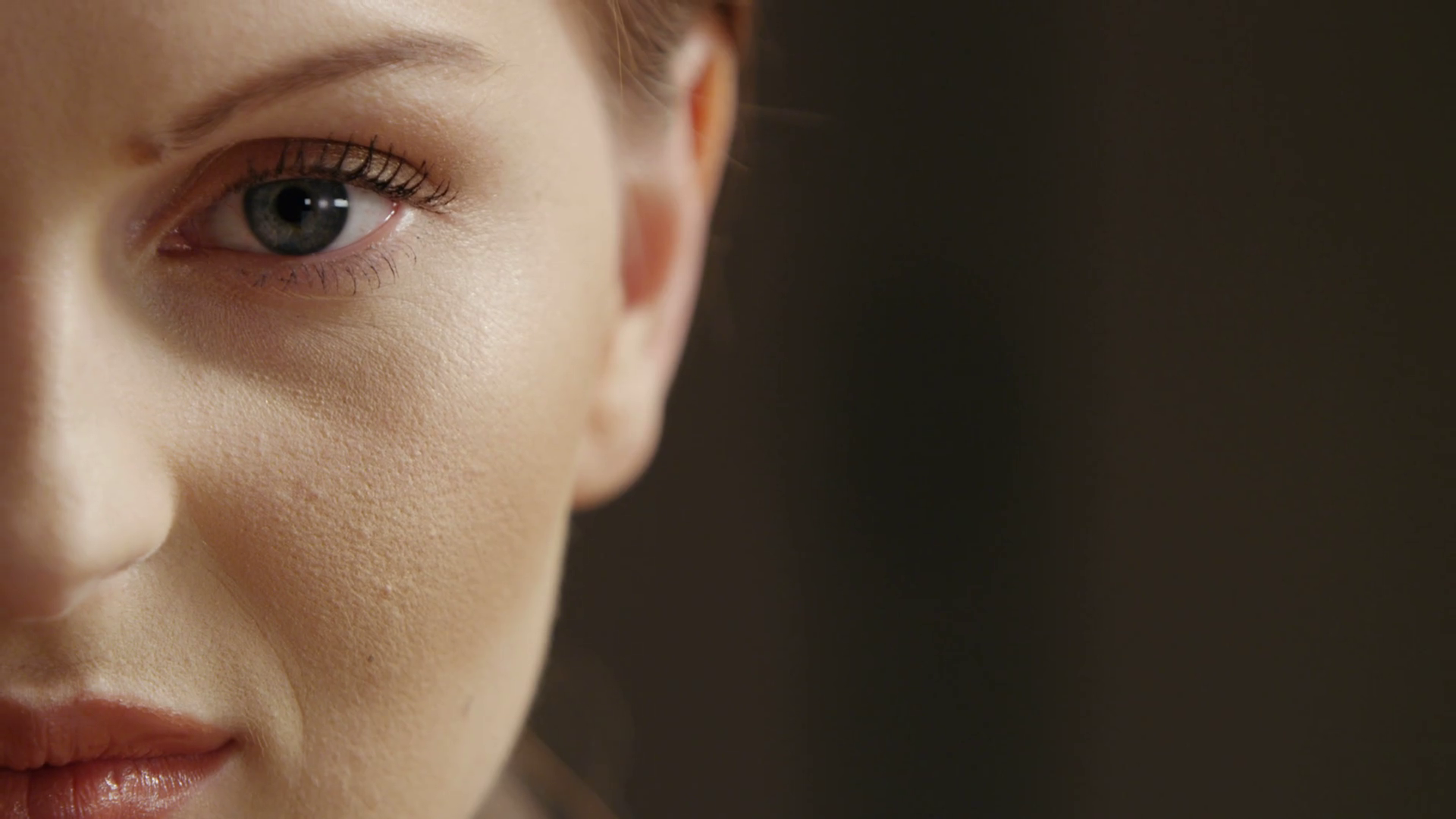 Pretty Young European Woman Closing Left Eye Stock Footage SBV ...