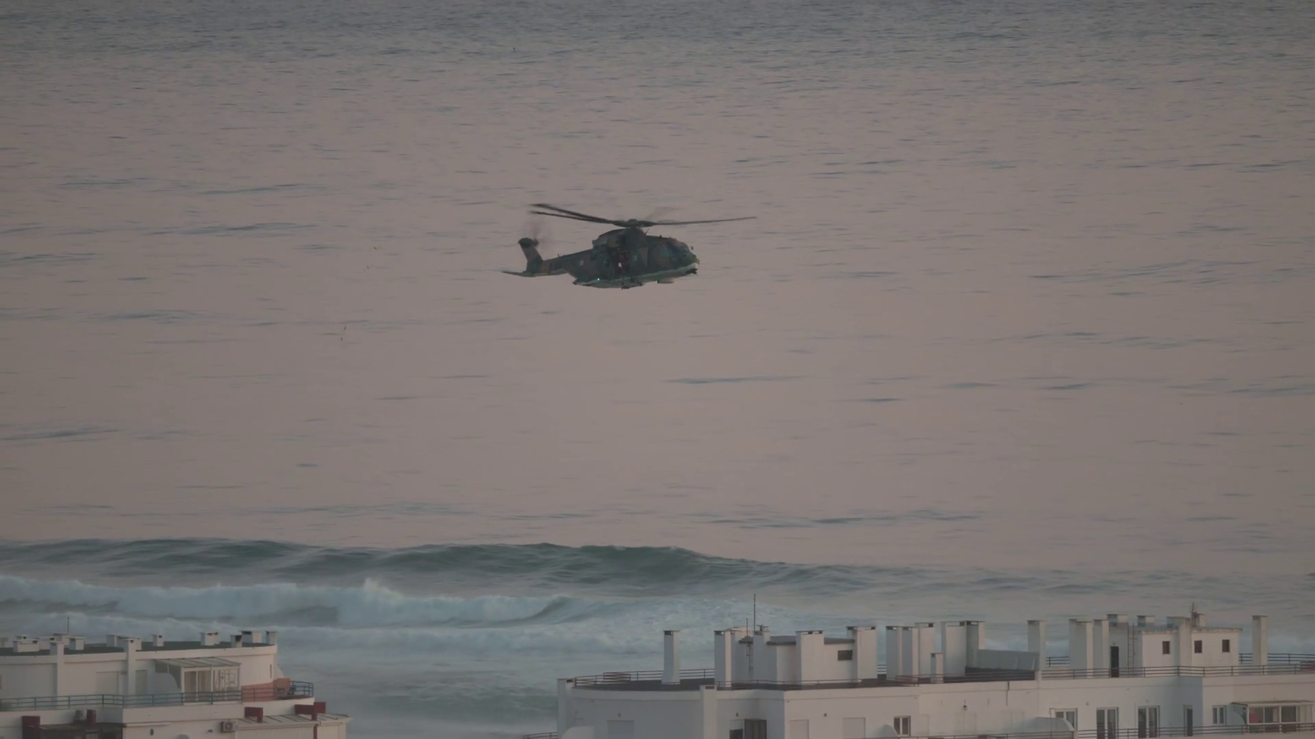 Military Helicopter Flying Over Ocean Near Stock Footage SBV-352007505 ...
