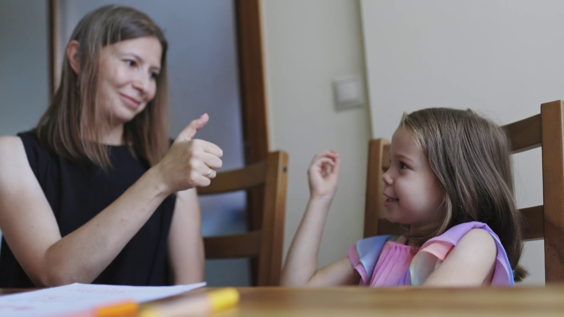 Woman Teaching Sign Language To Daughter Stock Footage SBV-352342721 ...