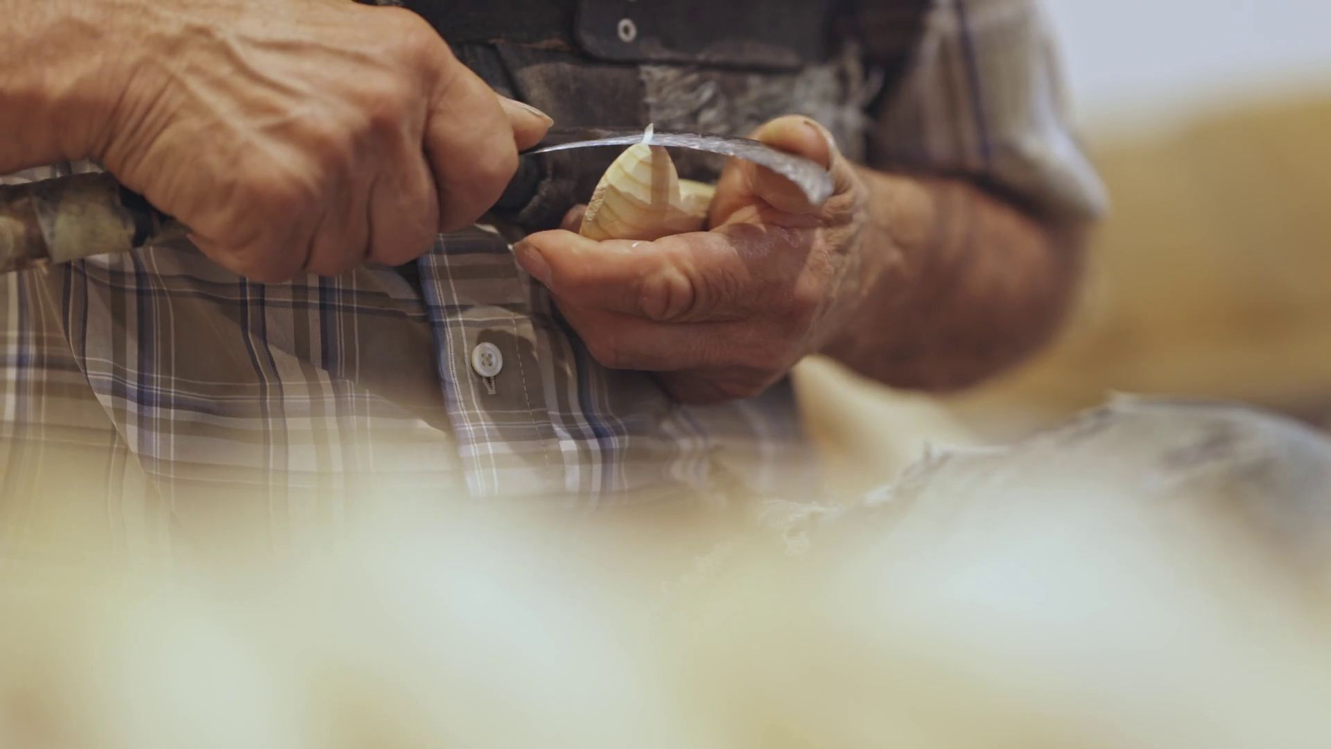 A Man Planing Wooden Figurine Using Sickle Stock Footage SBV-348432396 ...