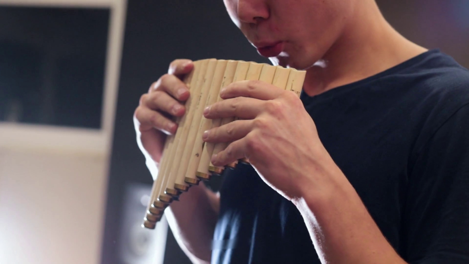 A Guy Playing On Instrument Wooden Pipe Stock Footage SBV-328389185 ...