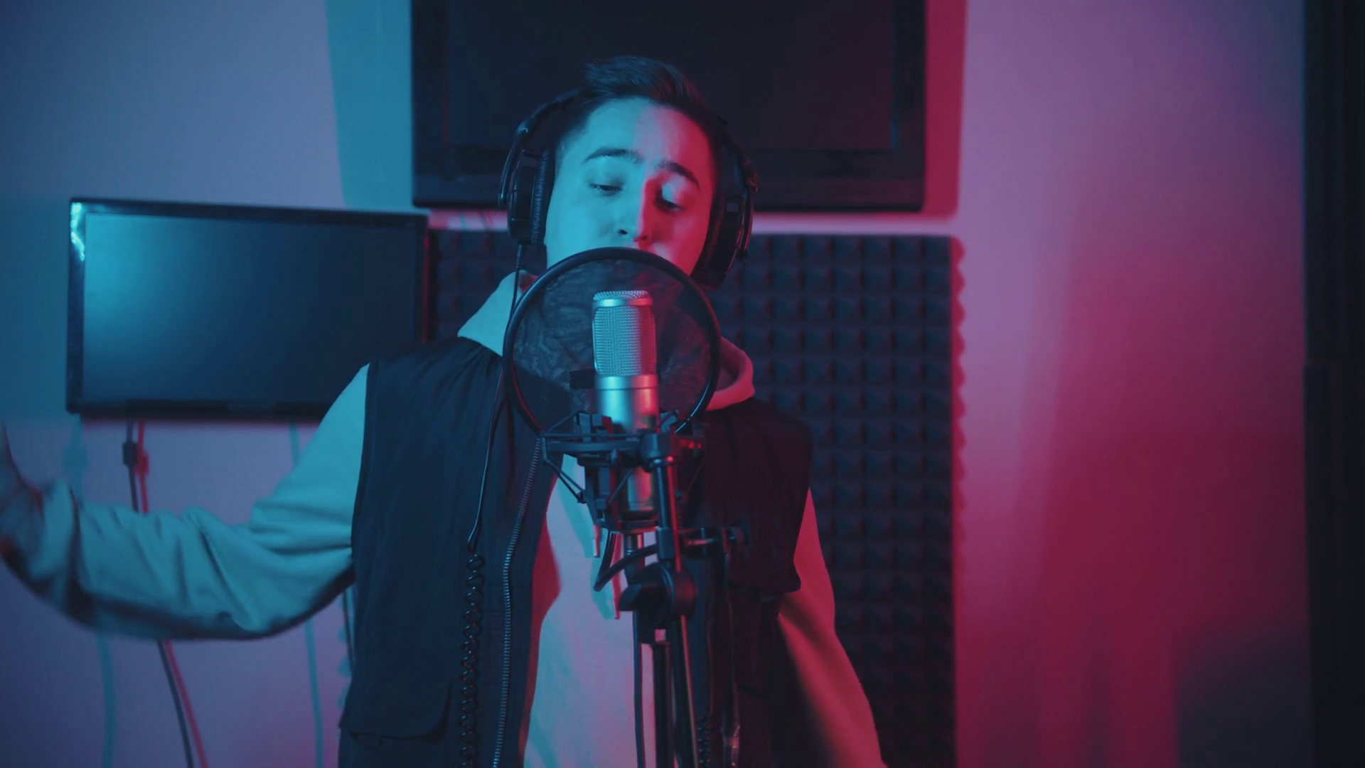 A Man In Headphones Rapping In Studio Stock Footage SBV-338109918 ...