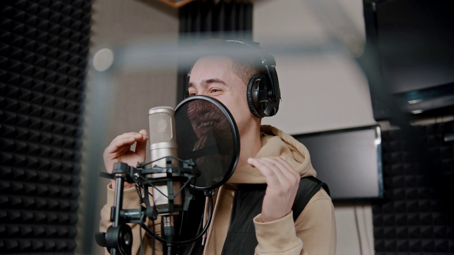 A man rapper recording his track in the studio Stock Video Footage 00: ...