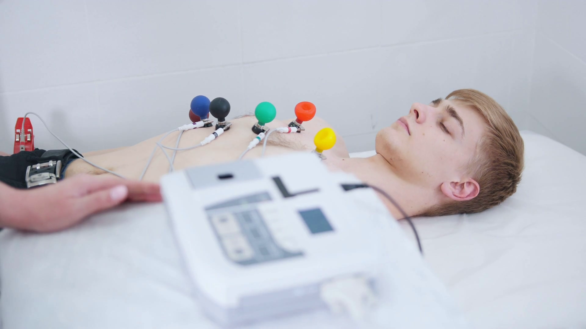 A Man Receiving Ecg Procedure Results Tape Stock Footage SBV-332467762 ...