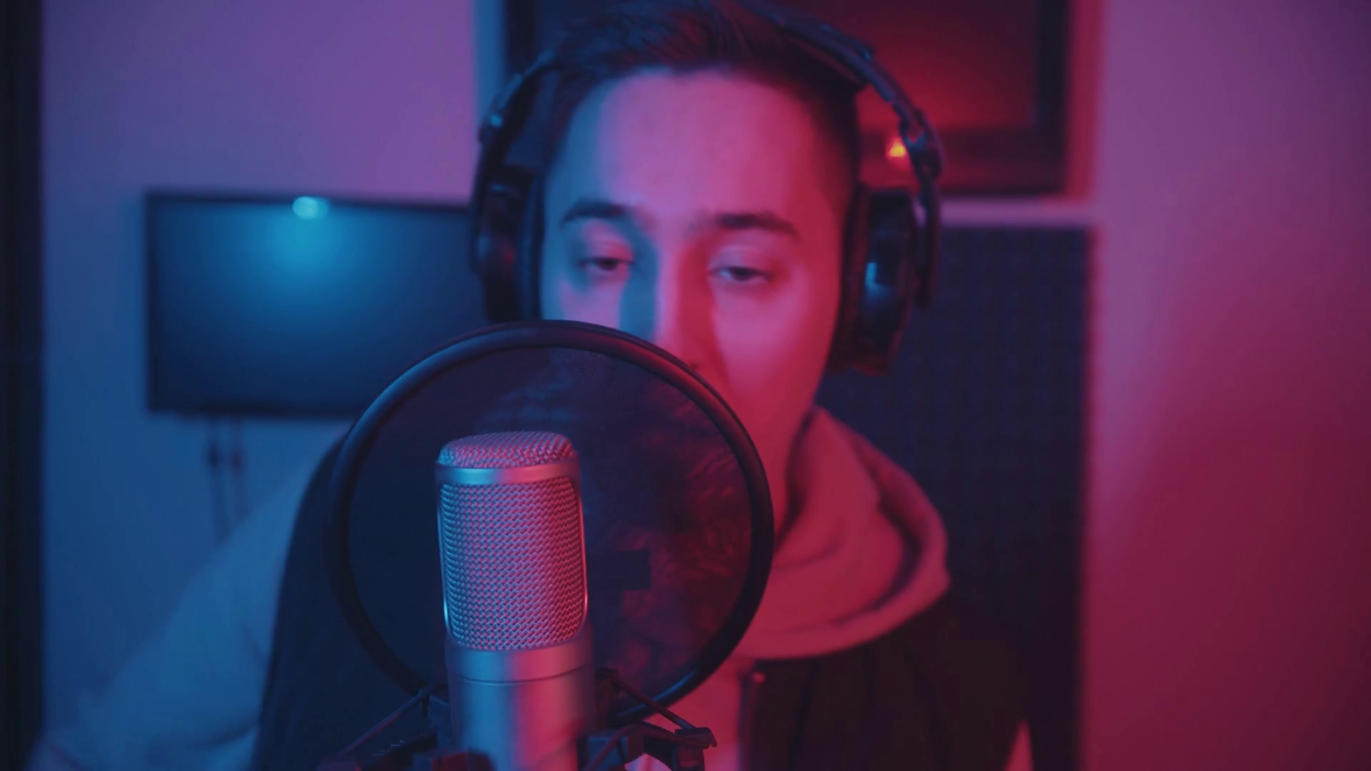 A Smiling Man Rapper In Headphones Recording Stock Footage SBV ...