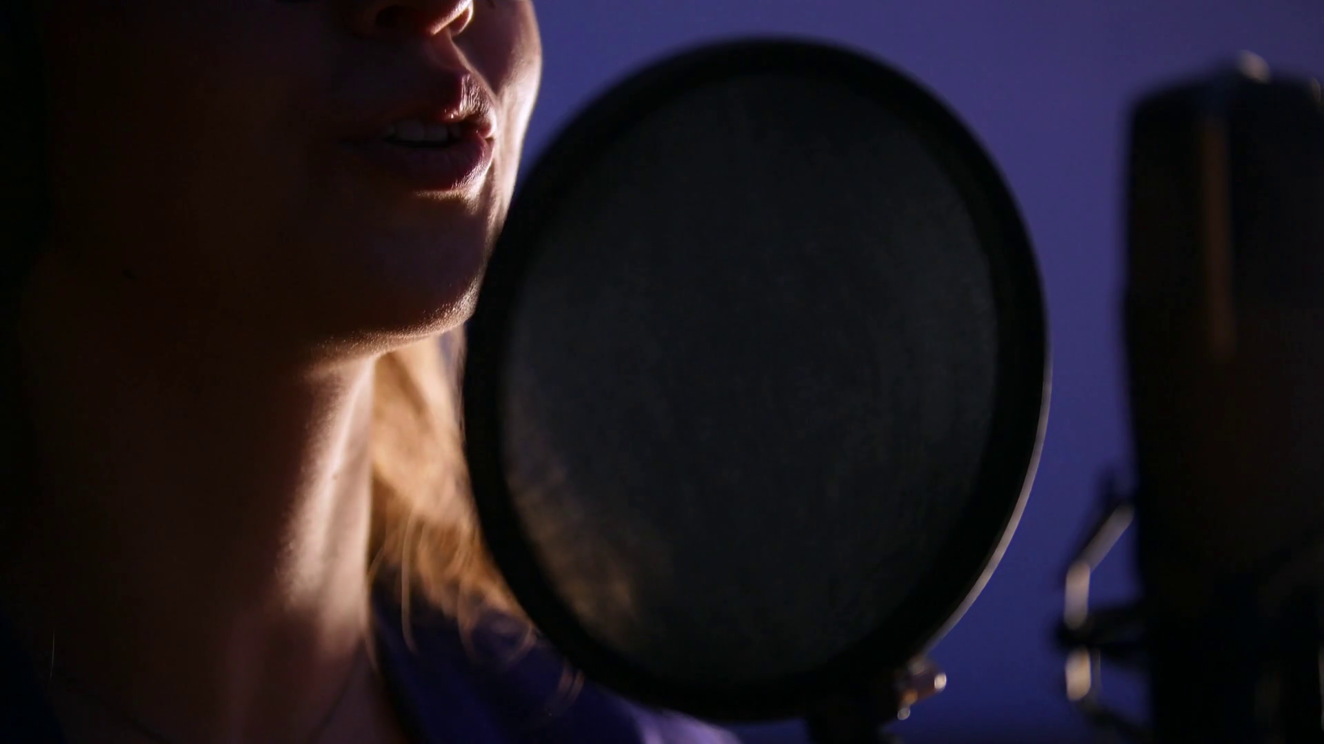 A young woman recording a song in the studio Stock Video Footage 00:11 ...