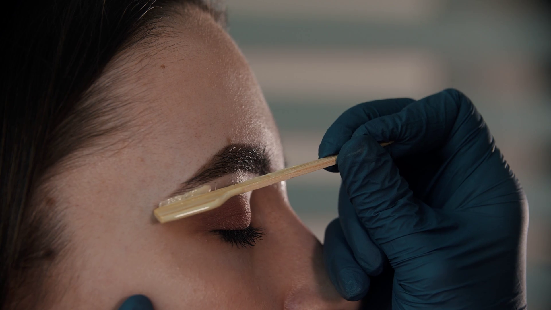 Brow Master Applying Wax On Brow Bone Of Stock Footage SBV-338534938 ...