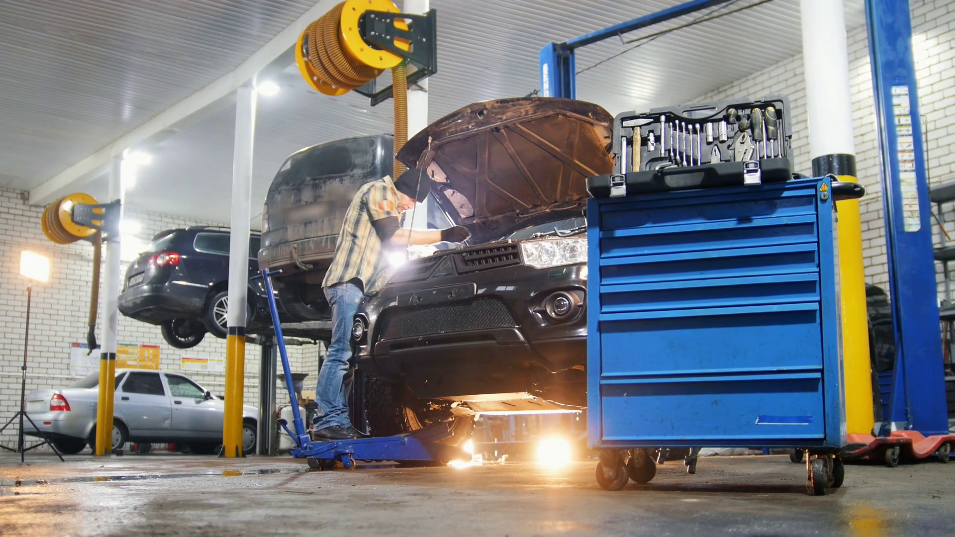 Car Service Mechanic Man Repairing Car Stock Footage SBV-331164462 ...