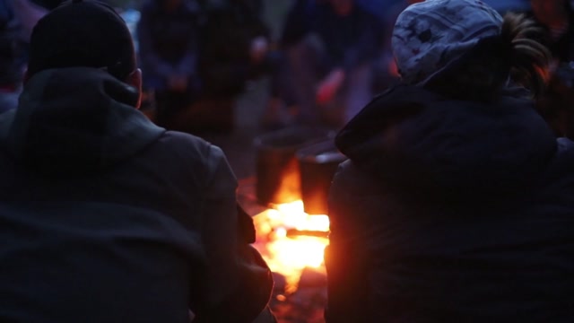 Cavemen Sitting Around Fire Stock Footage: Royalty-Free Video Clips ...