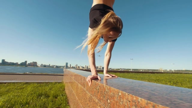 Handstand Girl Stock Footage: Royalty-Free Video Clips - Storyblocks
