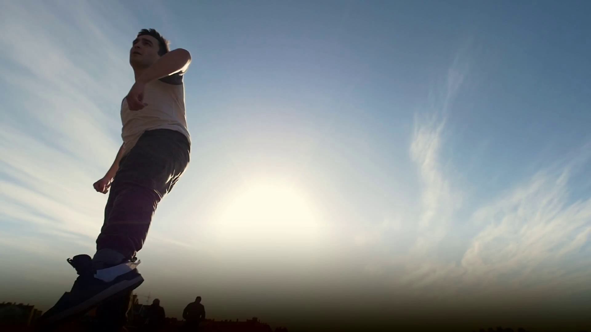 Young male Parkour tricker jumper performs amazing flips, silhouette ...