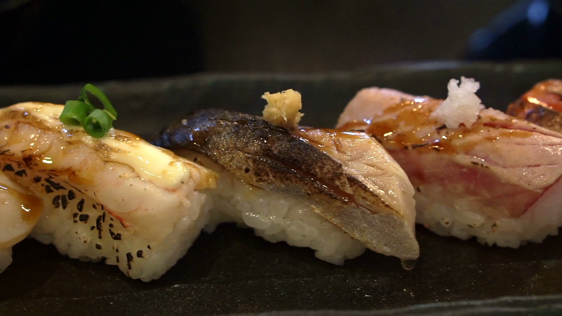 Aburi nigiri set or seared sushi set. Japanese food, raw fish with fast ...