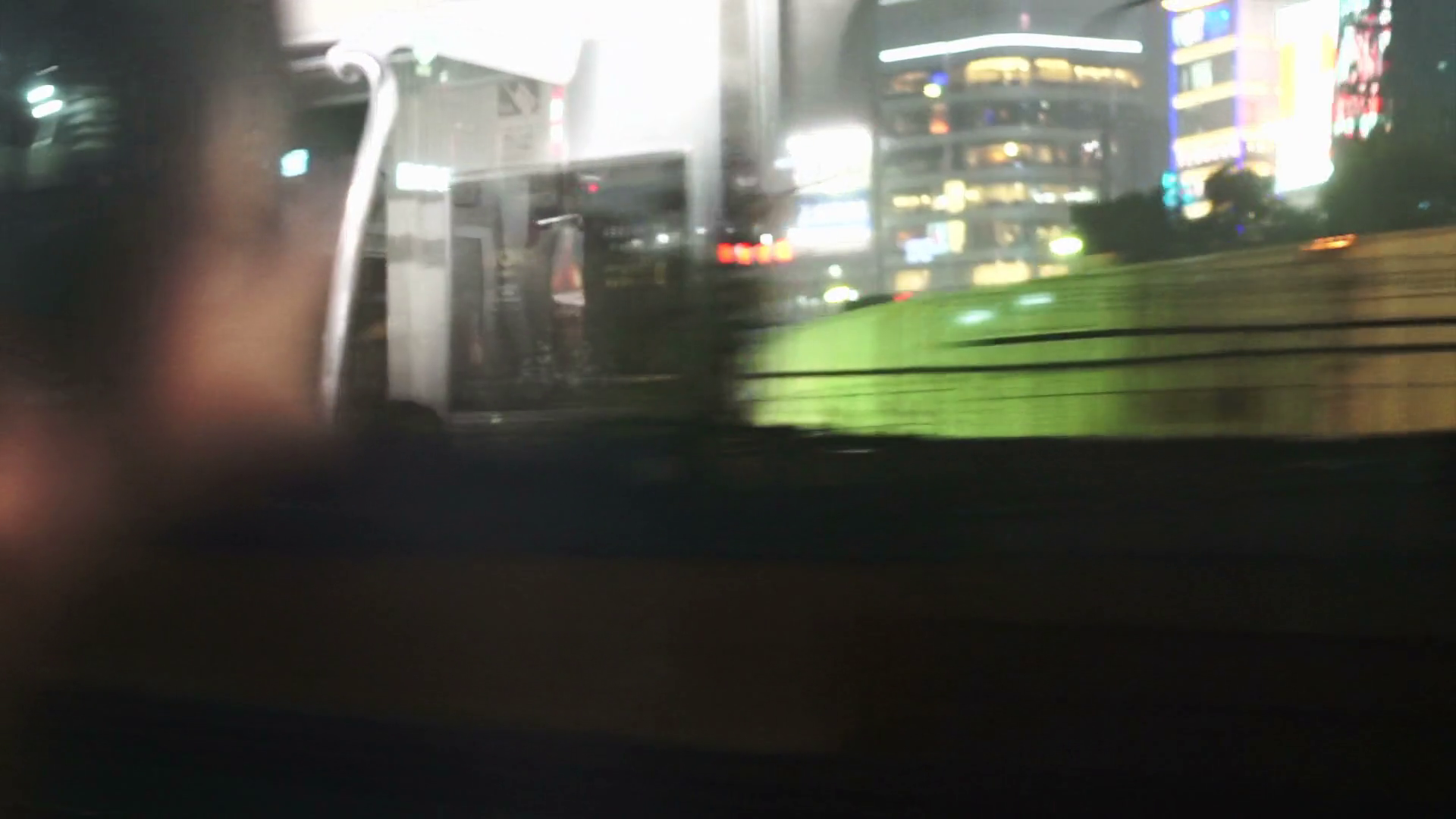 City view and night lights with train interior reflection through glass ...