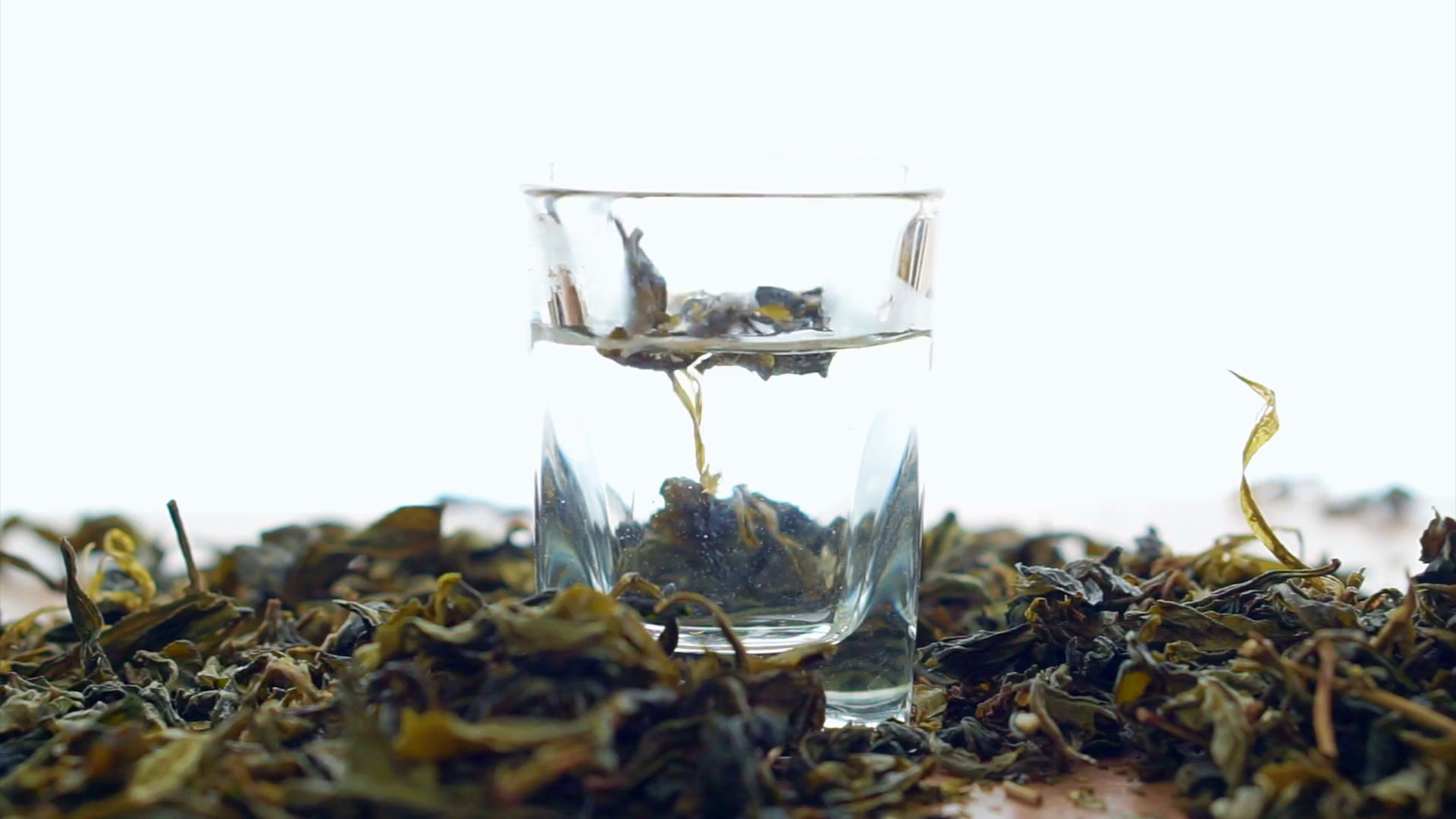 Tea Leaf Dissolving In Warm Water On Plain Stock Footage SBV-304655151 ...