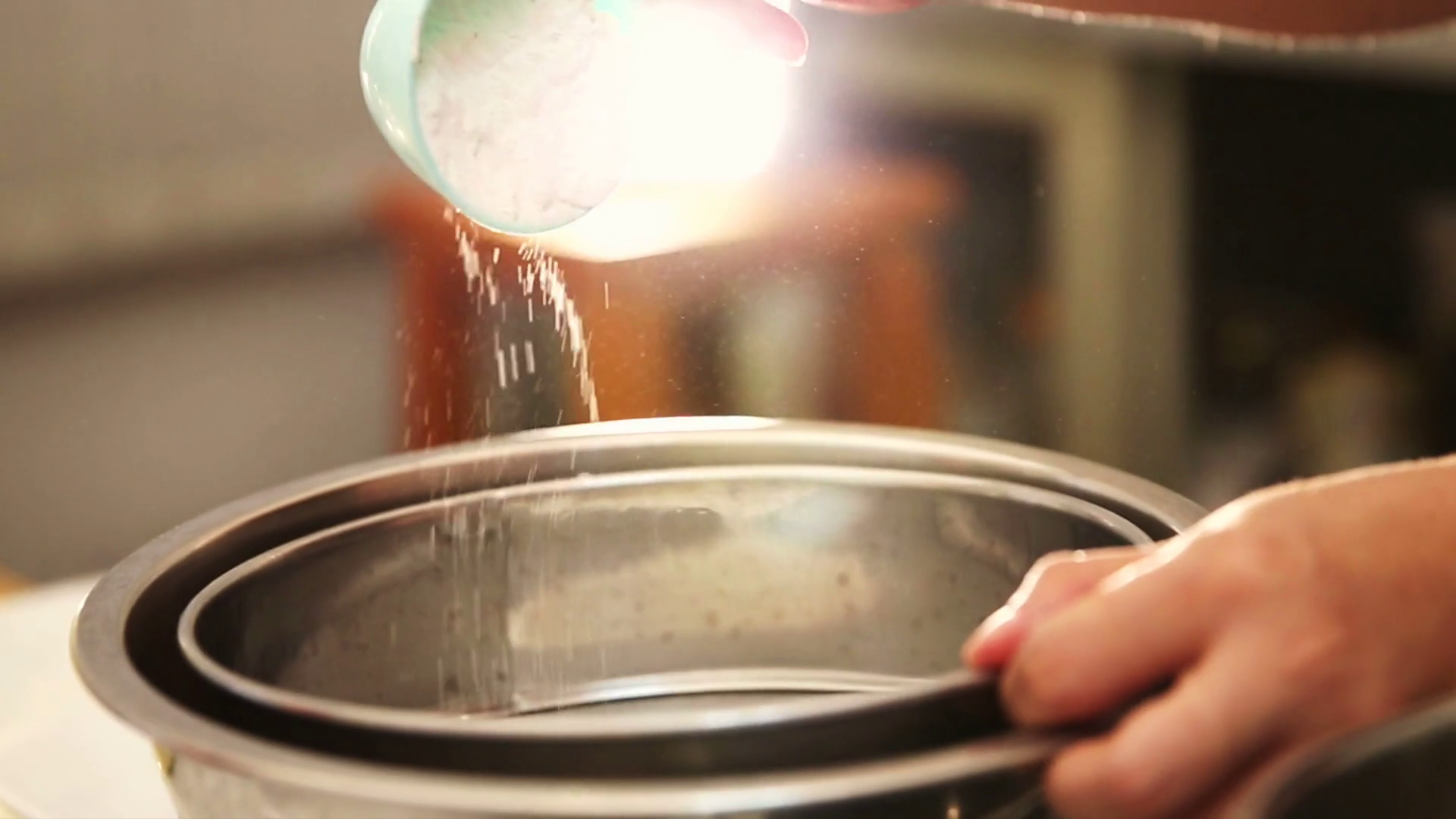 Video Hand Sifting Dusting Flour With Light Stock Footage SBV-304468373 ...