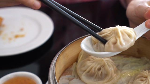 Eating Dumpling Stock Footage: Royalty-Free Video Clips - Storyblocks