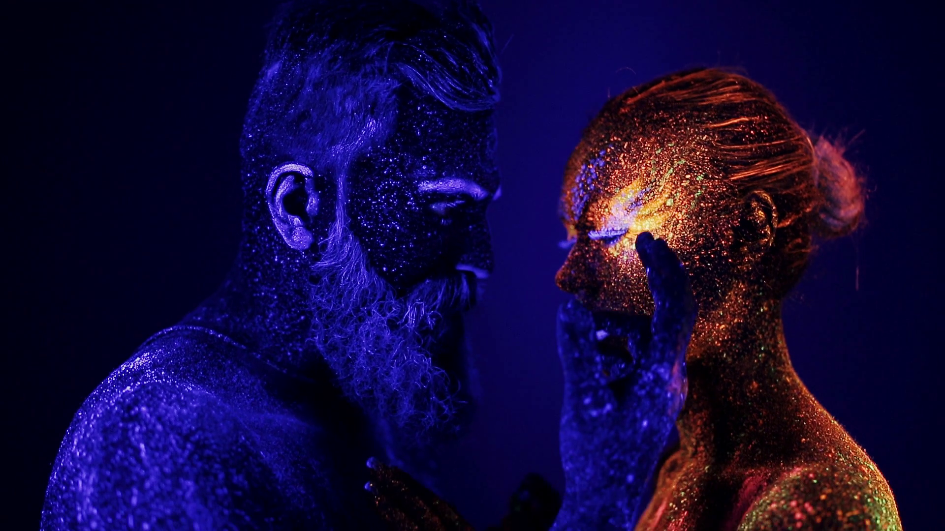 A Man Woman In Ultraviolet Light Caress Fire Stock Footage SBV ...