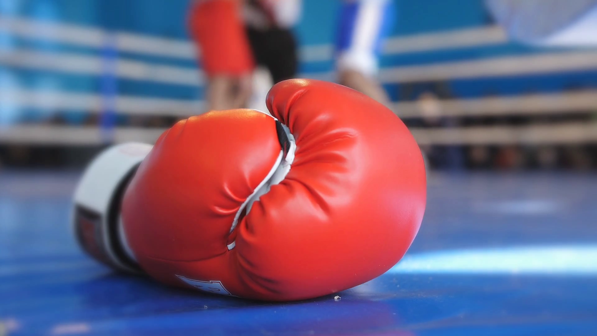 Boxing Gloves Laying In Ring In Background Stock Footage SBV-332241349 ...