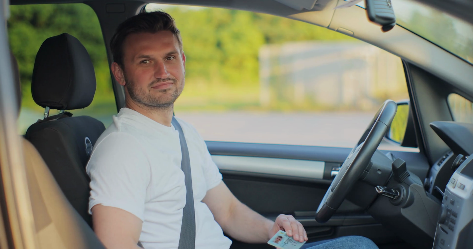 Male Smiling Holding Digital Driving License Stock Footage SBV ...