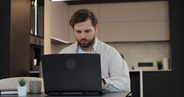 Confused Office Worker On Computer Stock Footage: Royalty-Free Video ...