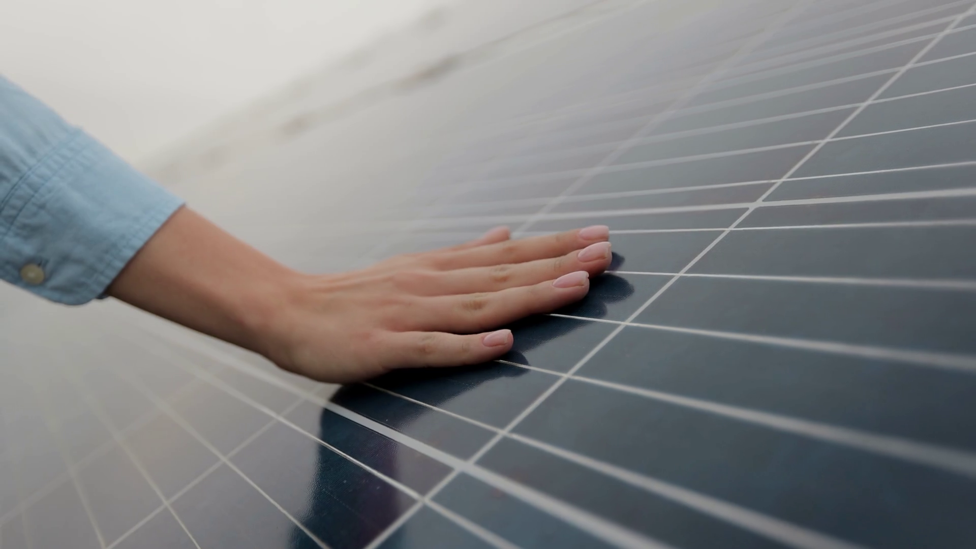 Close up of woman engineer hand is checking with solar panels. The ...