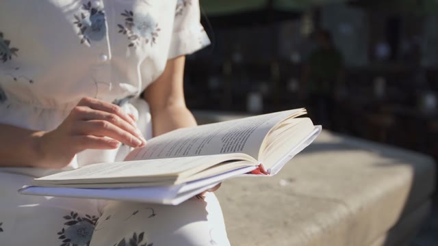 Walking With Book Stock Footage: Royalty-Free Video Clips - Storyblocks