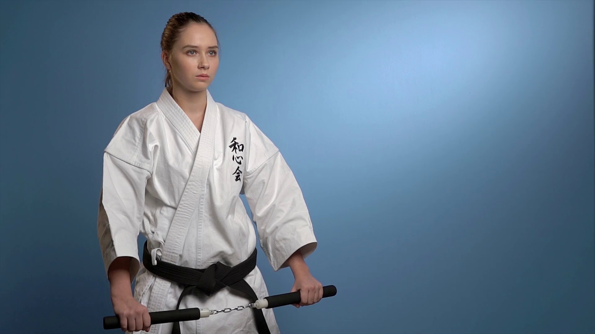 A Karate Woman Fighting With Nunchuck Stock Footage SBV-311259187 ...