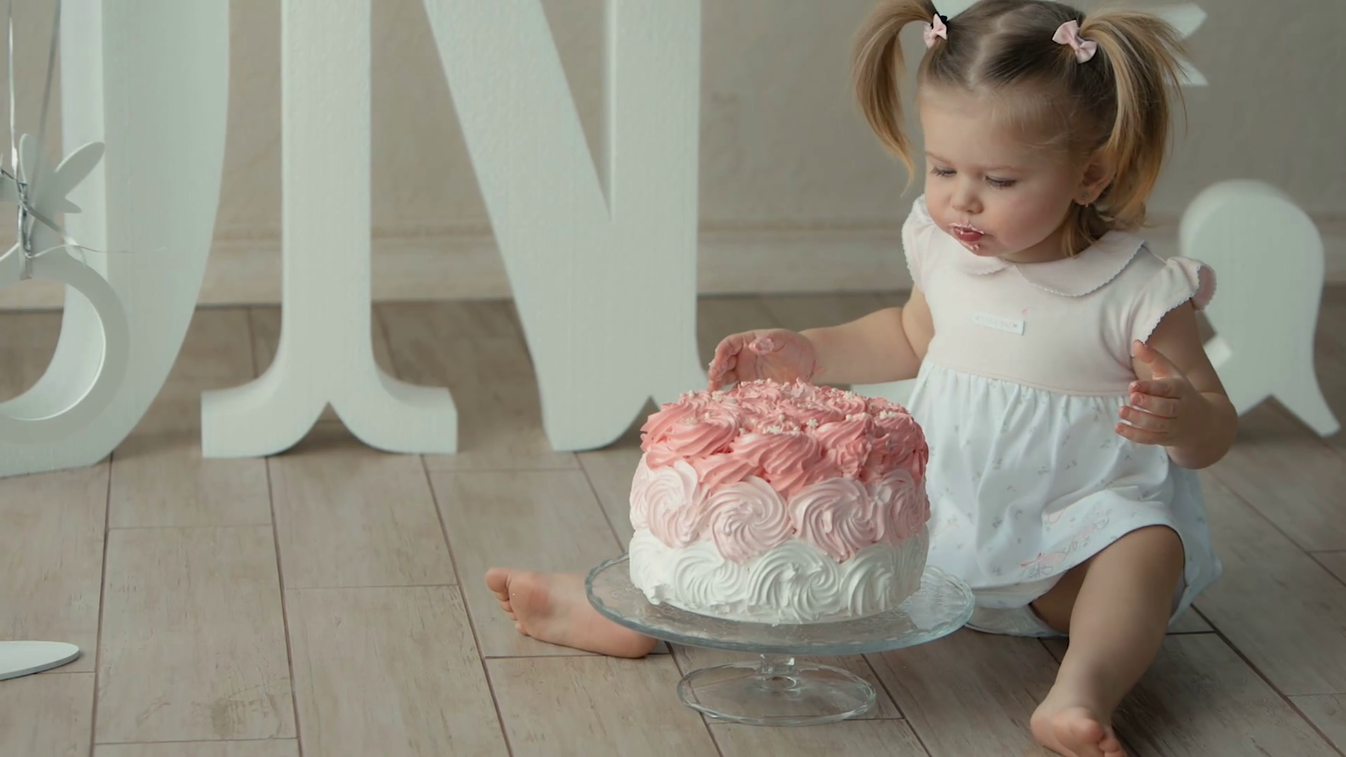 Baby Biting Birthday Cake Stock Footage SBV-312559386 - Storyblocks