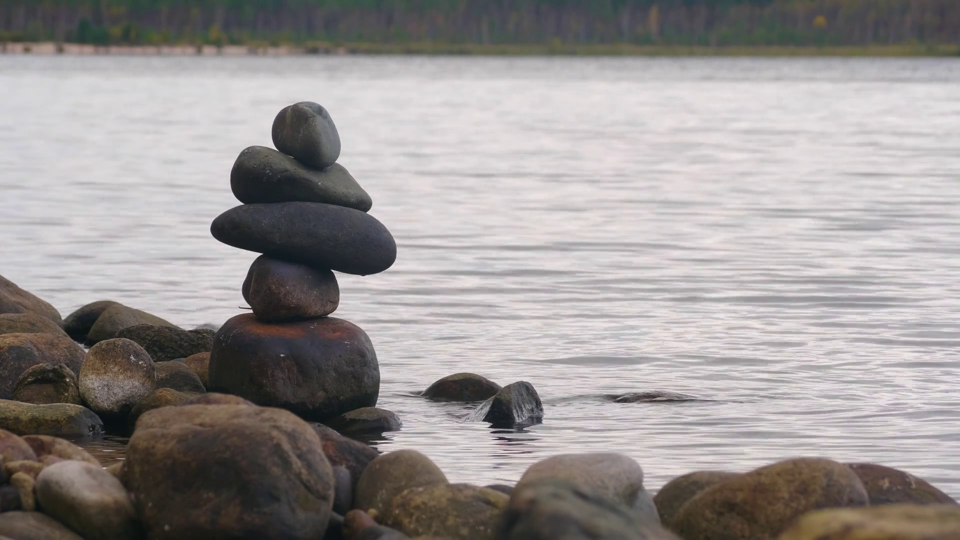 Cairn Rock Stack On Lakeshore Surrounded Stock Footage SBV-352143669 ...