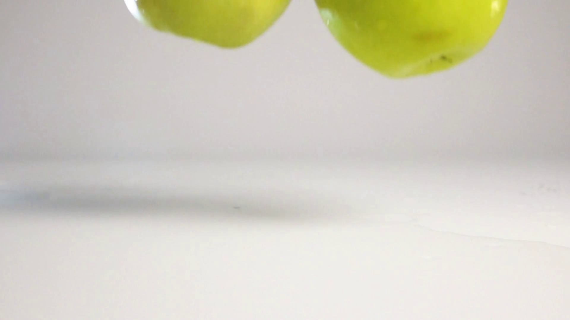 Two Fresh Green Apples Falling Down Jumping Stock Footage SBV-307042880 ...