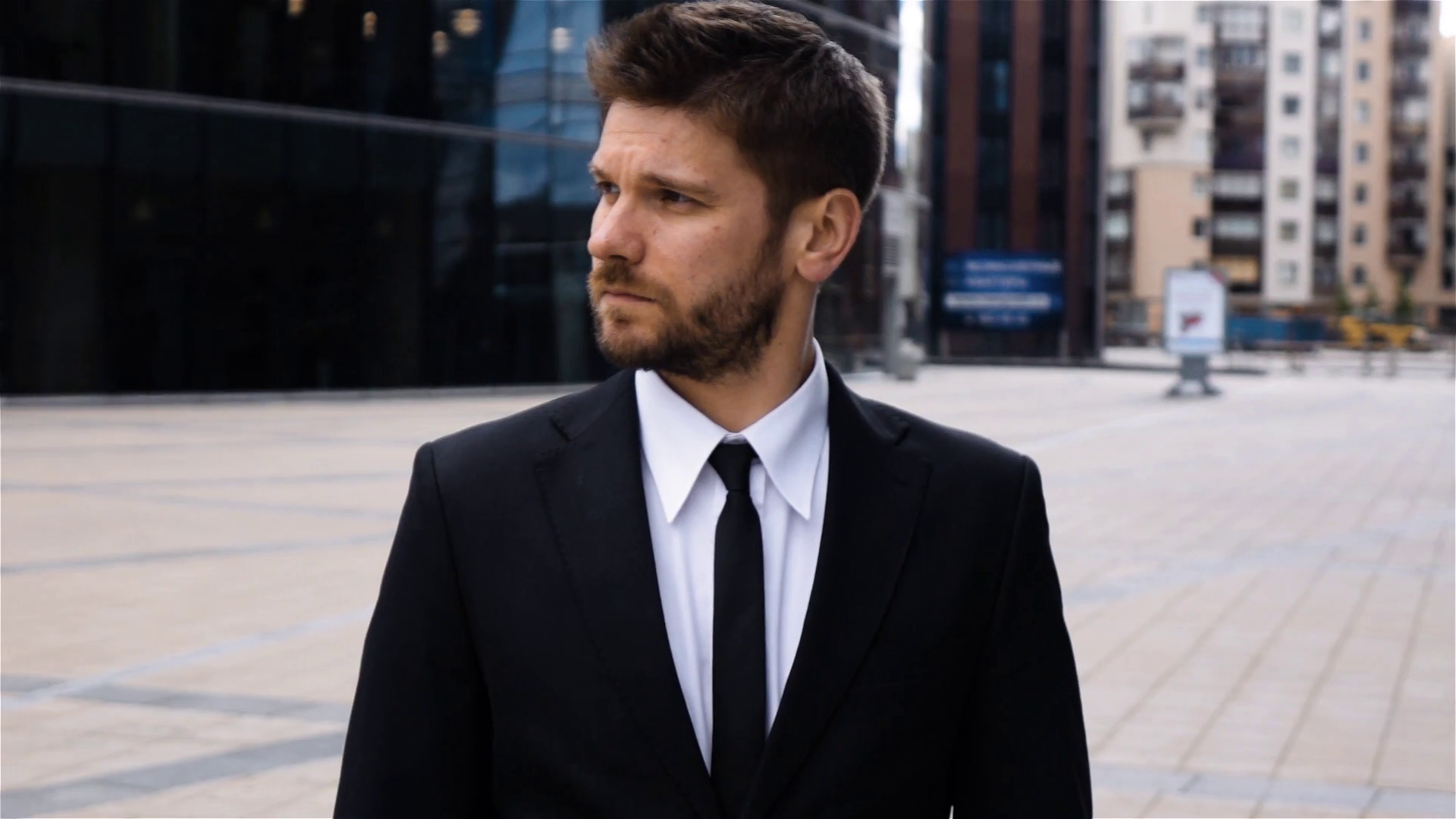 Front Portrait view of boss entrepreneur turning his head and looking ...