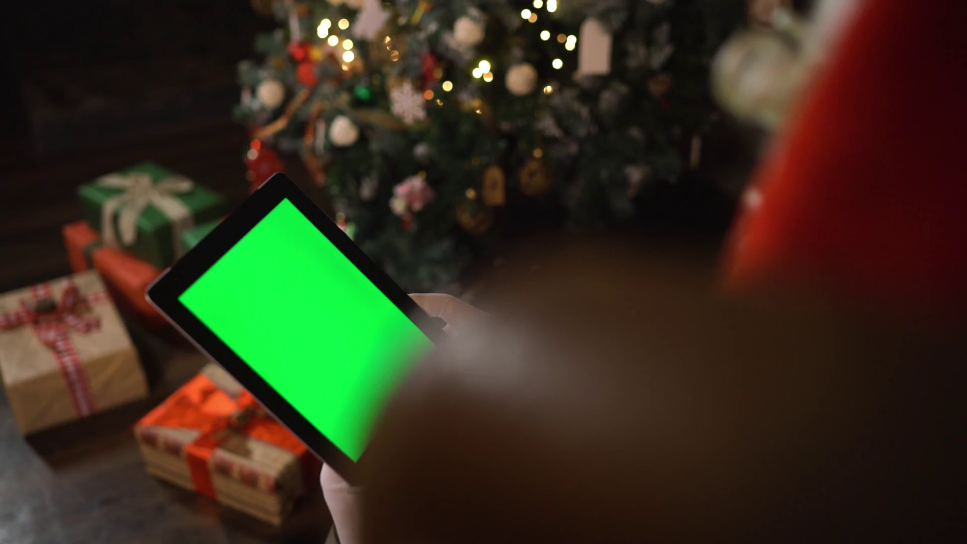 Santa Claus Choose Gifts on IPad. Tablet with Green Screen in Vertical ...