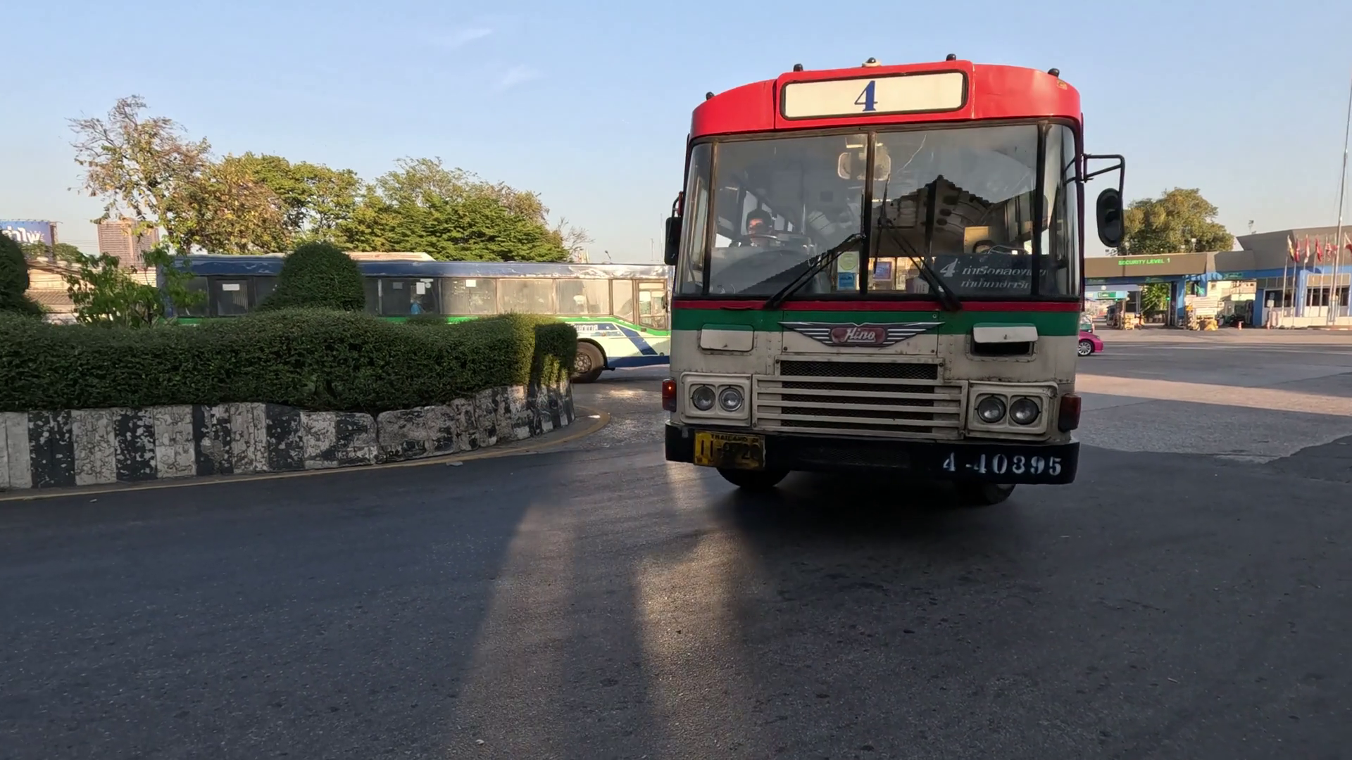 Red Bus Approaching Stopping Stock Footage SBV-352708541 - Storyblocks