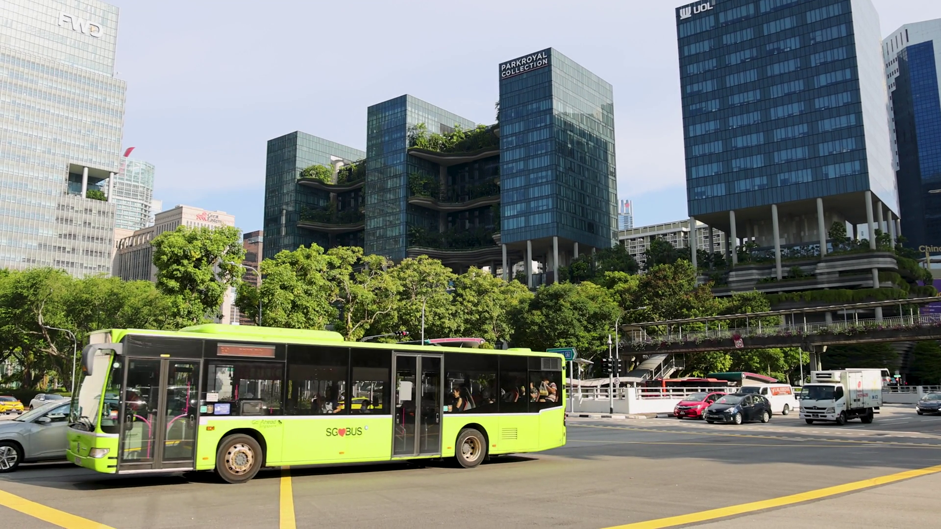 Green City Bus Crossing Downtown Singapore Stock Footage SBV-352660272 ...