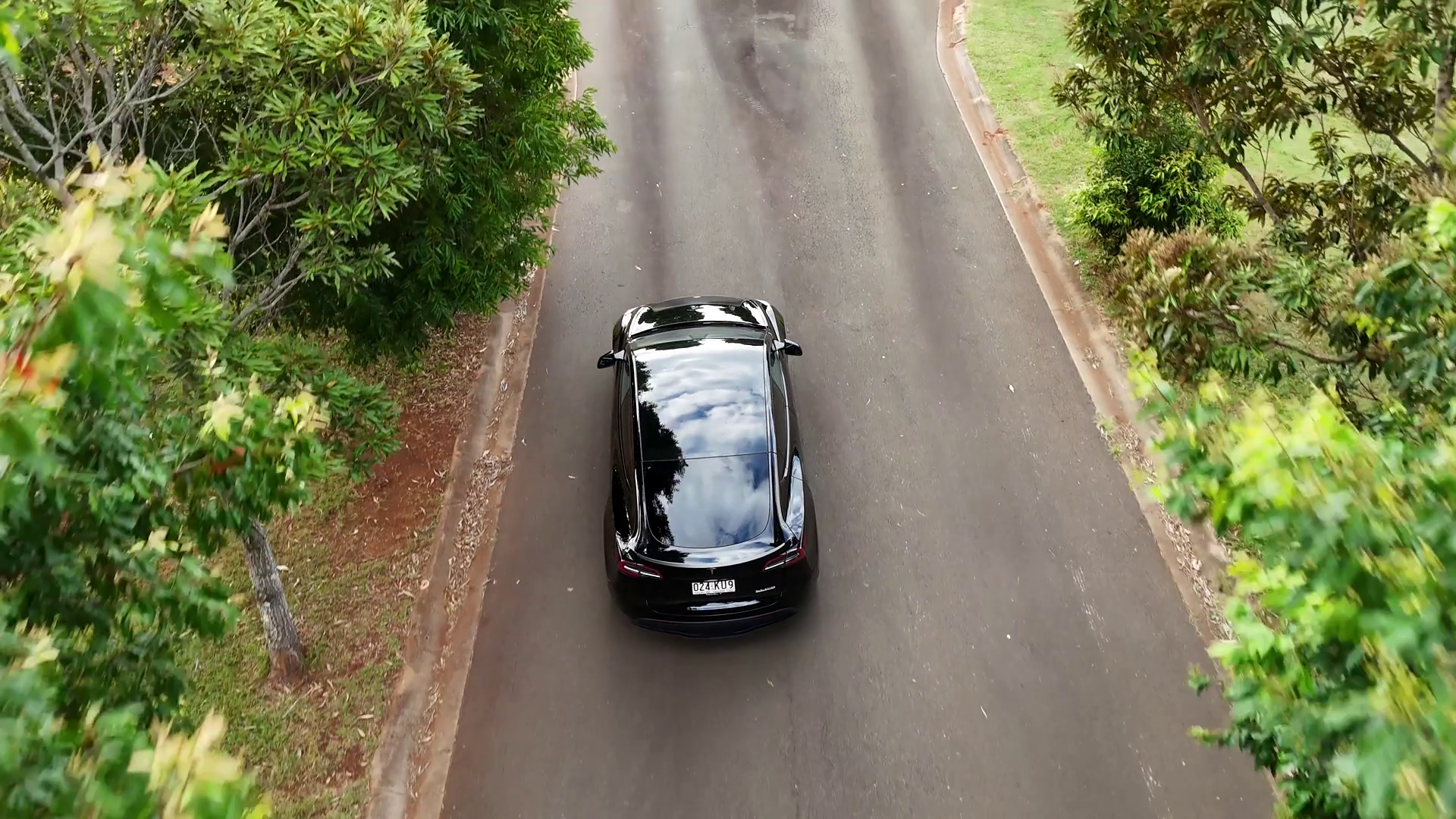 Aerial View Of Tesla Suburban Drive Stock Footage SBV-352402413 ...