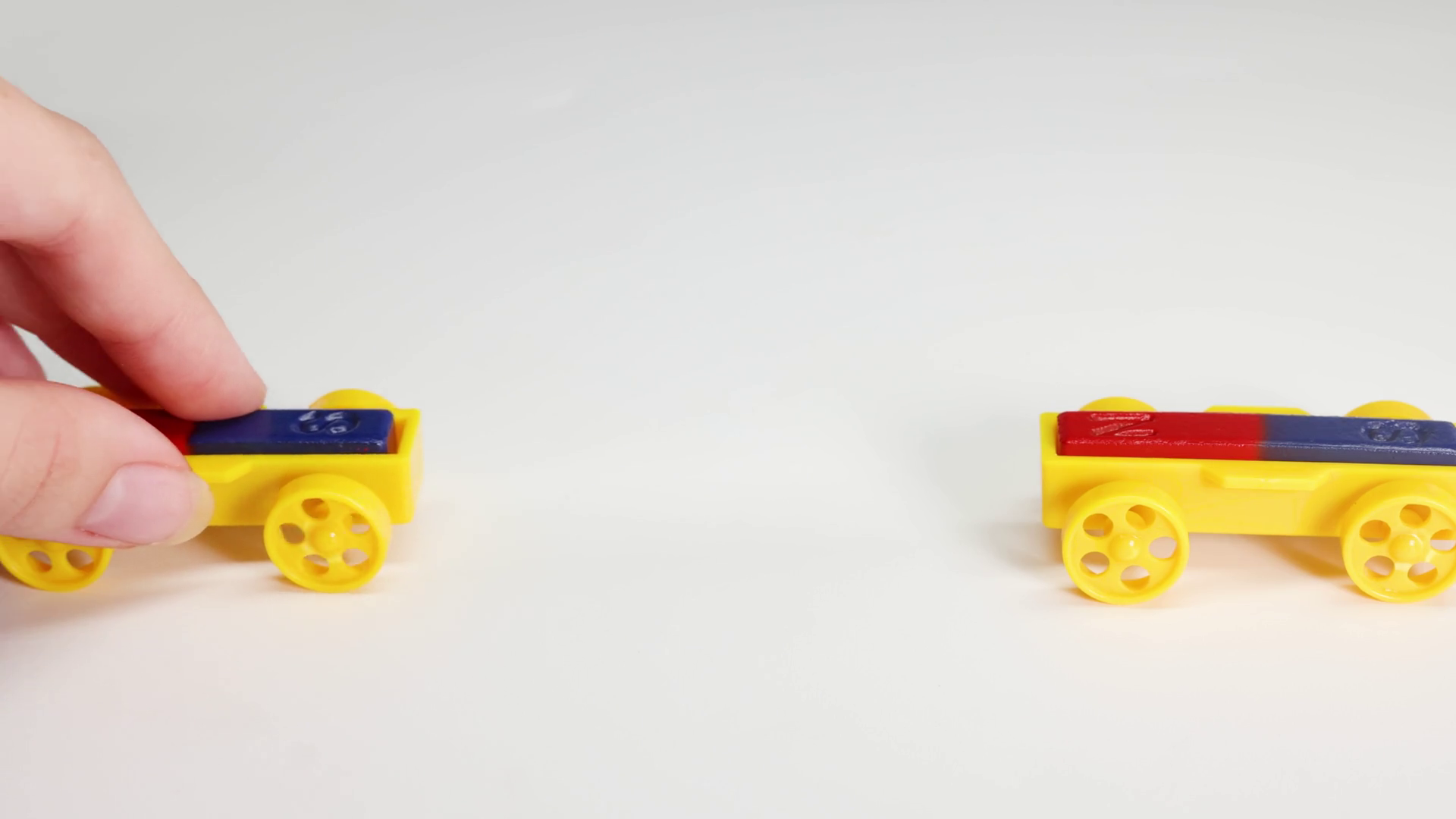 Magnetic Toy Cars Demonstrating Attraction Stock Footage SBV-352582956 ...