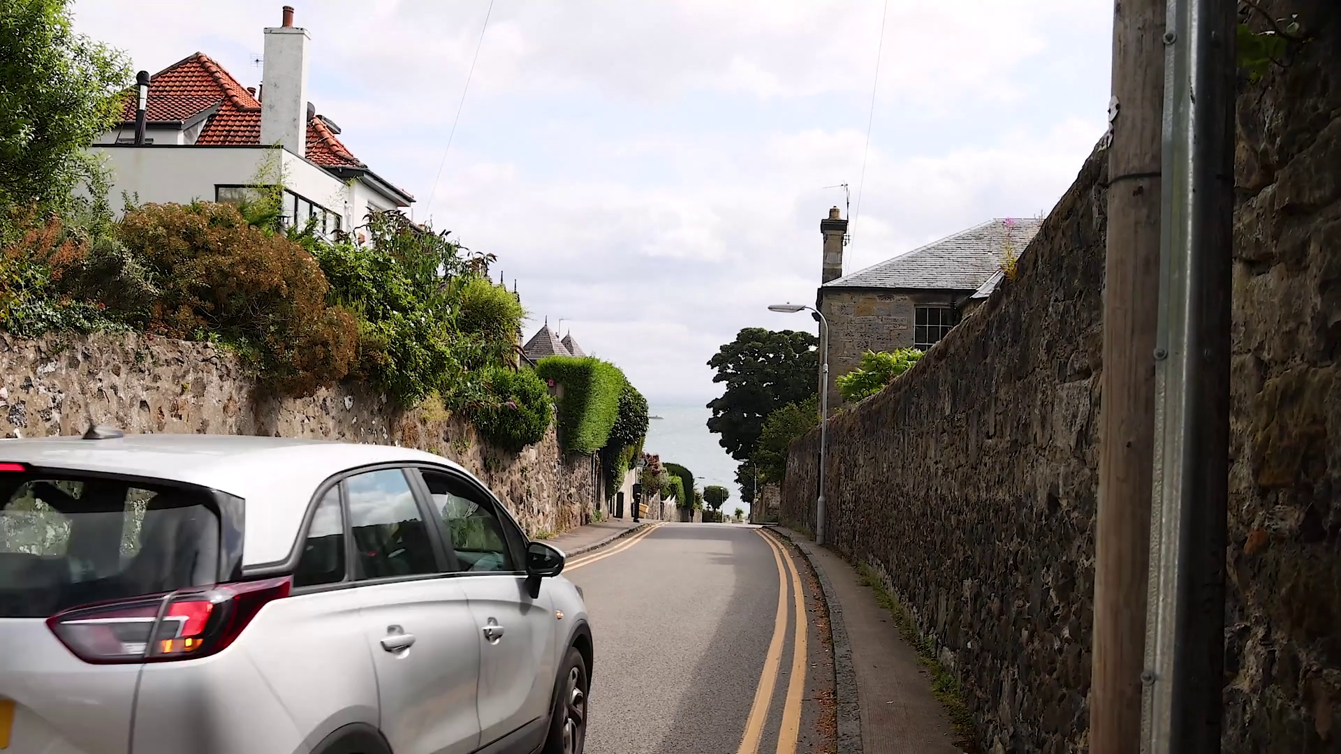 Cars Driving On Narrow Street Stock Footage SBV-352797208 - Storyblocks