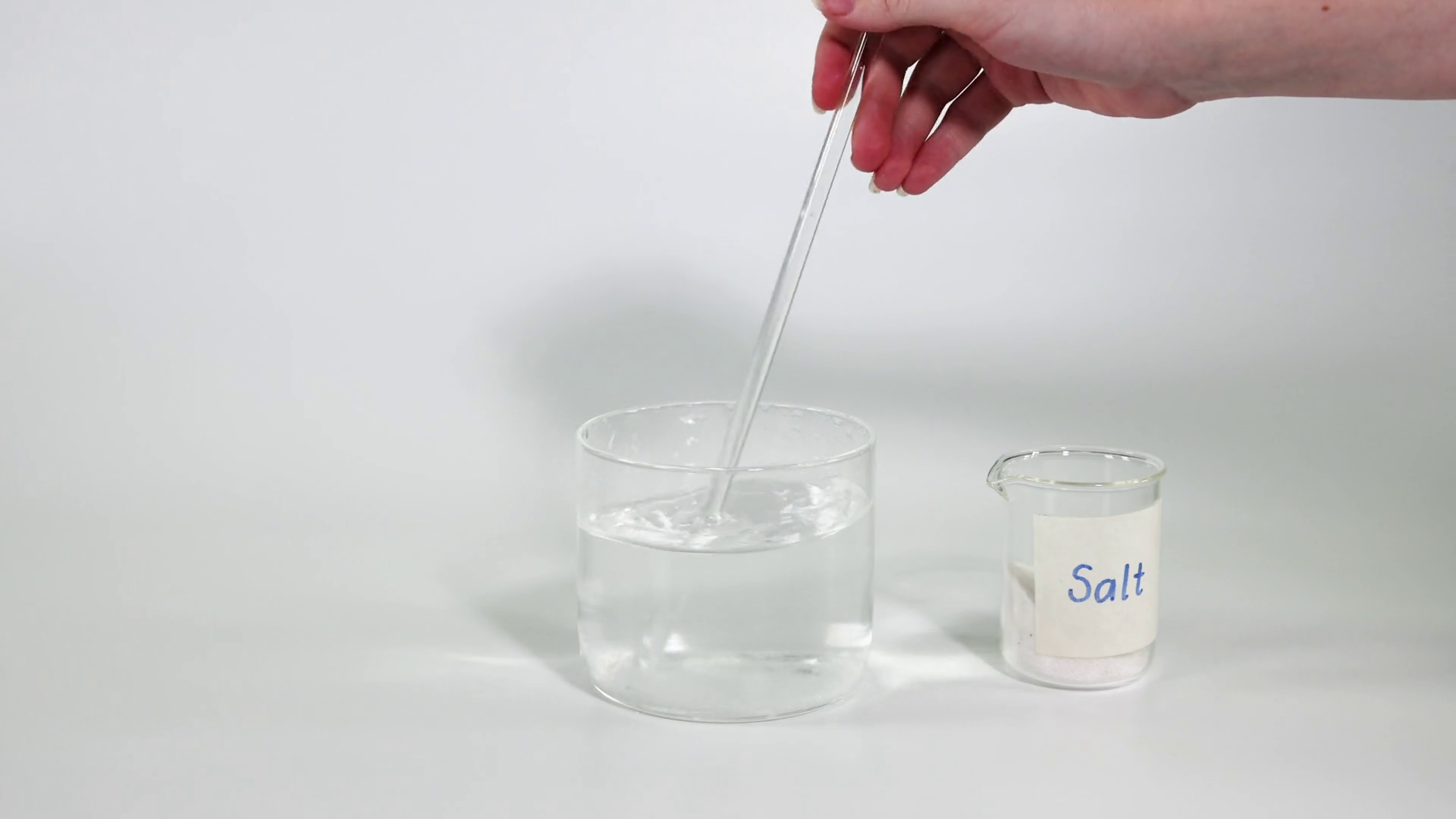 Demonstration Of Salt Dissolving In Water Stock Footage SBV-353007276 ...