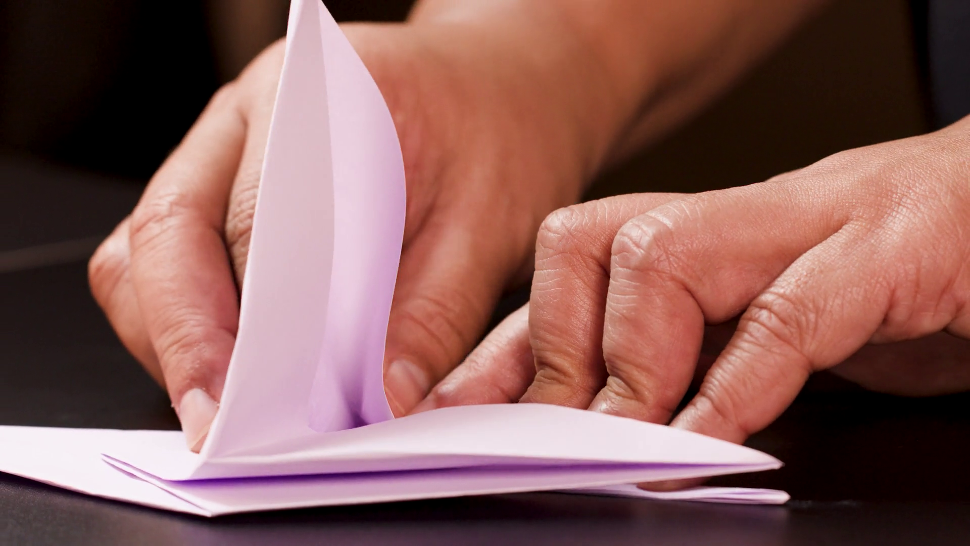 Hands Folding Origami Paper Boat On Dark Stock Footage SBV-353193961 ...