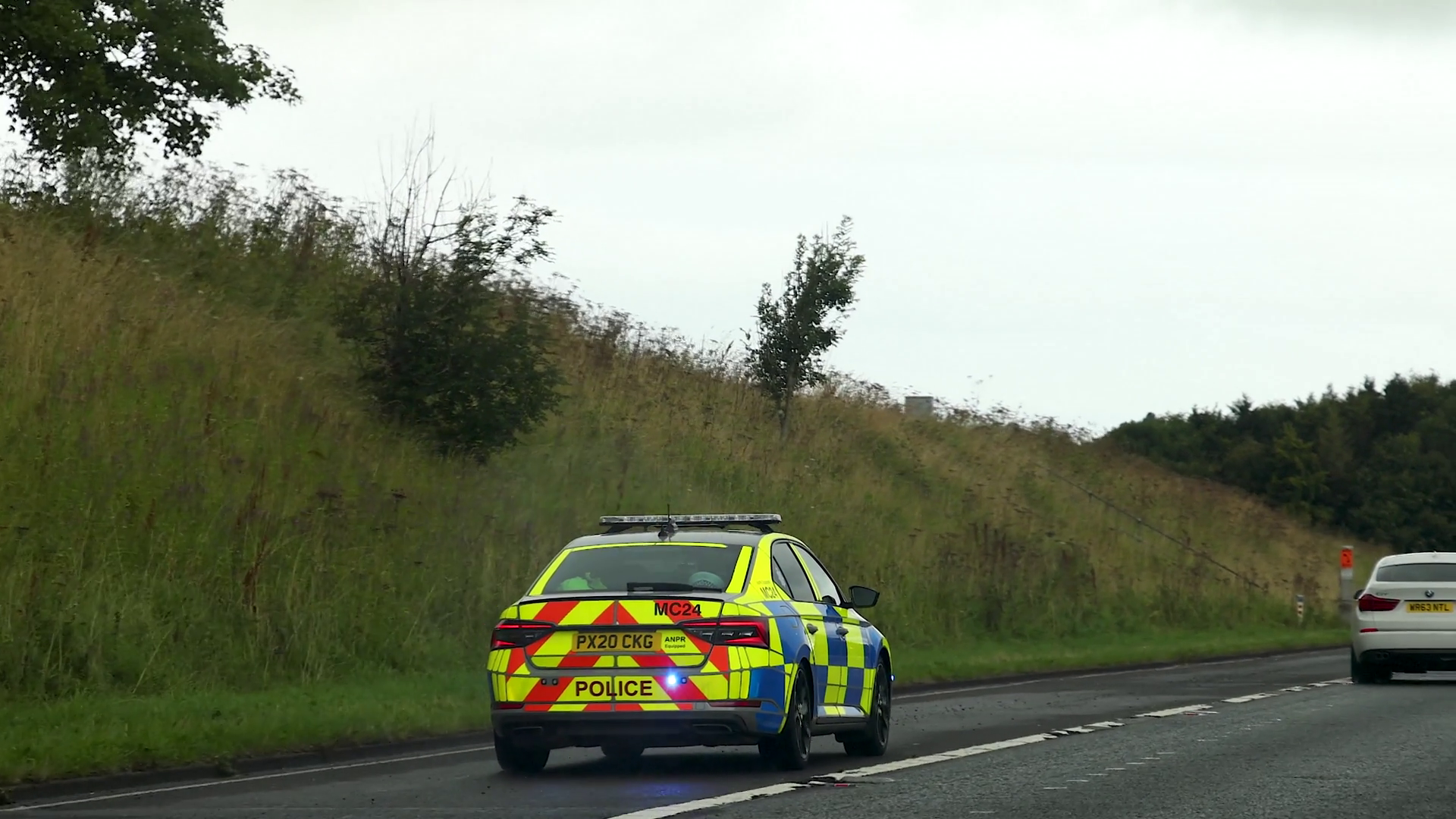 Police Car Following Vehicle On Road Stock Footage SBV-352780926 ...