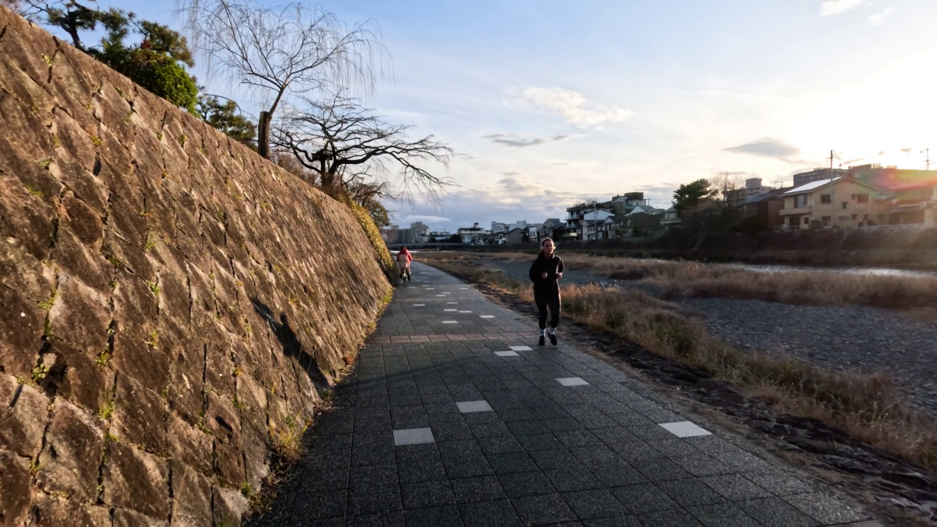 Jogging Along Kyoto River Canal Stock Footage SBV-352685262 - Storyblocks