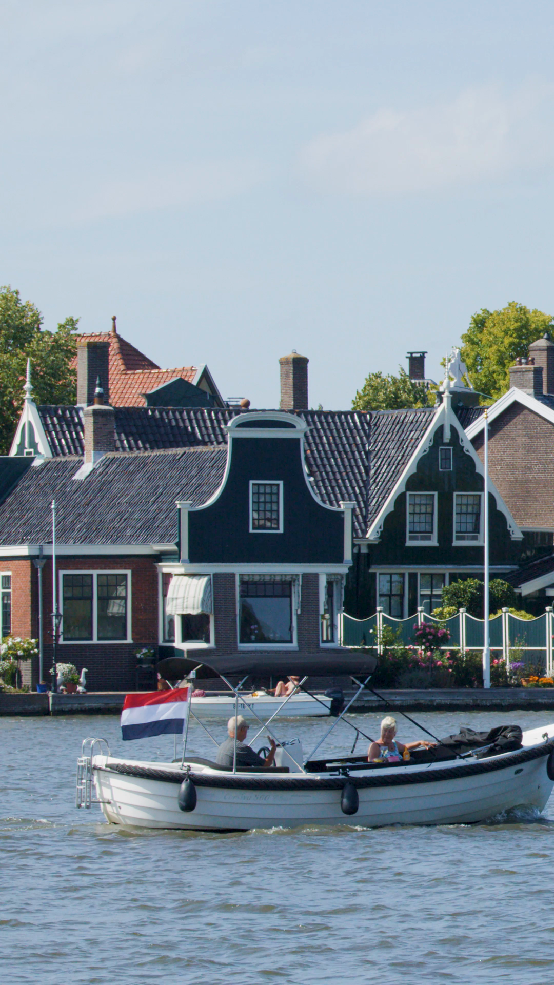 Small Motorboat Passing Traditional Dutch Stock Footage SBV-353096309 ...