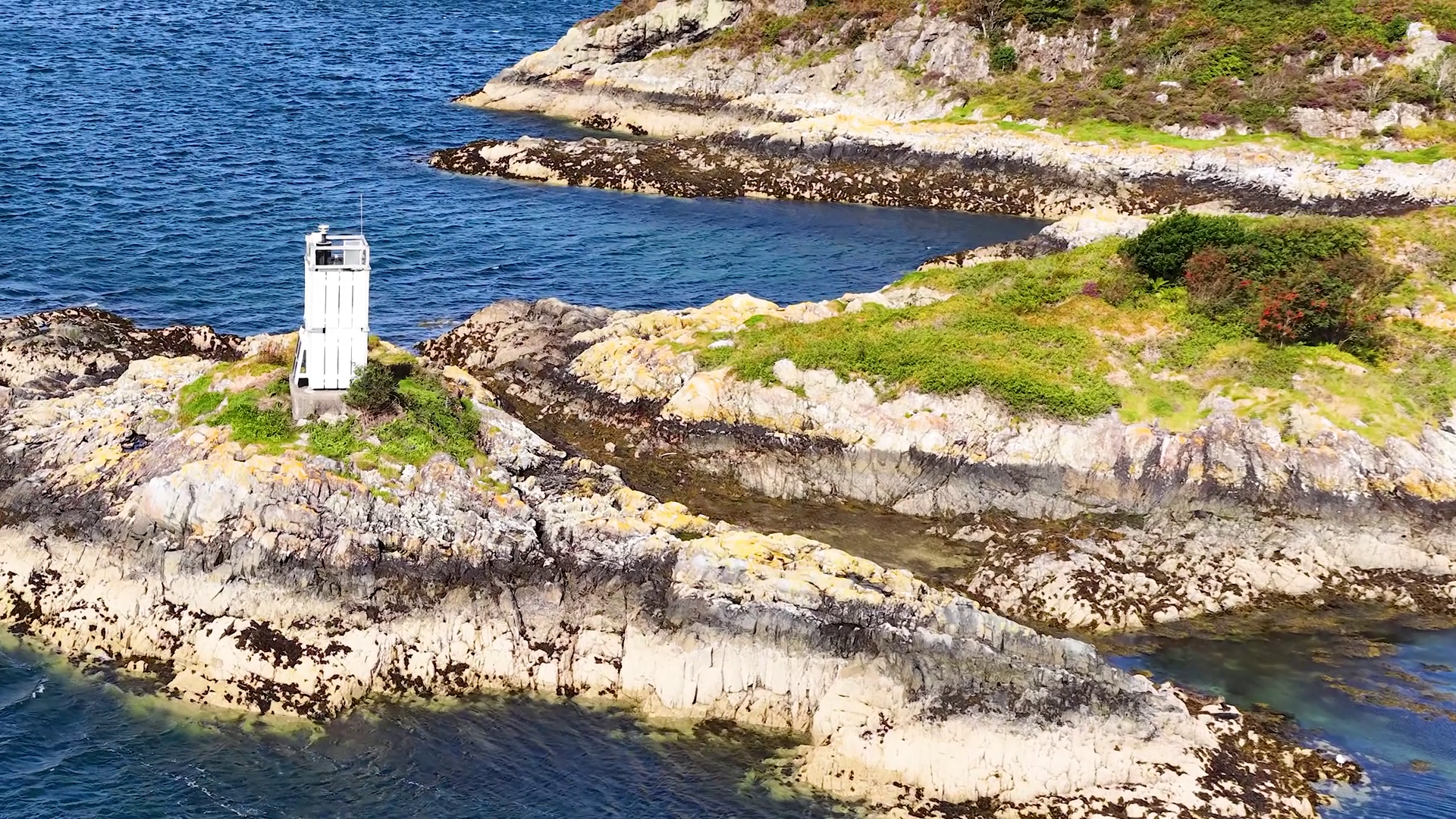 Aerial Approach To Small Lighthouse On Stock Footage SBV-353187438 ...