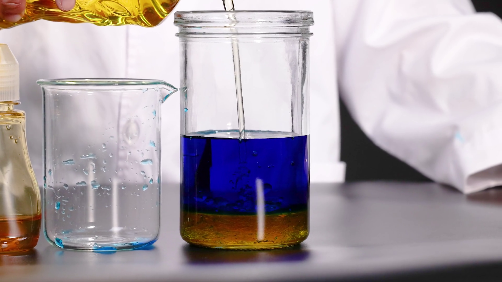 Colorful Liquid Experiment In Glass Jar Stock Footage SBV-352530930 ...