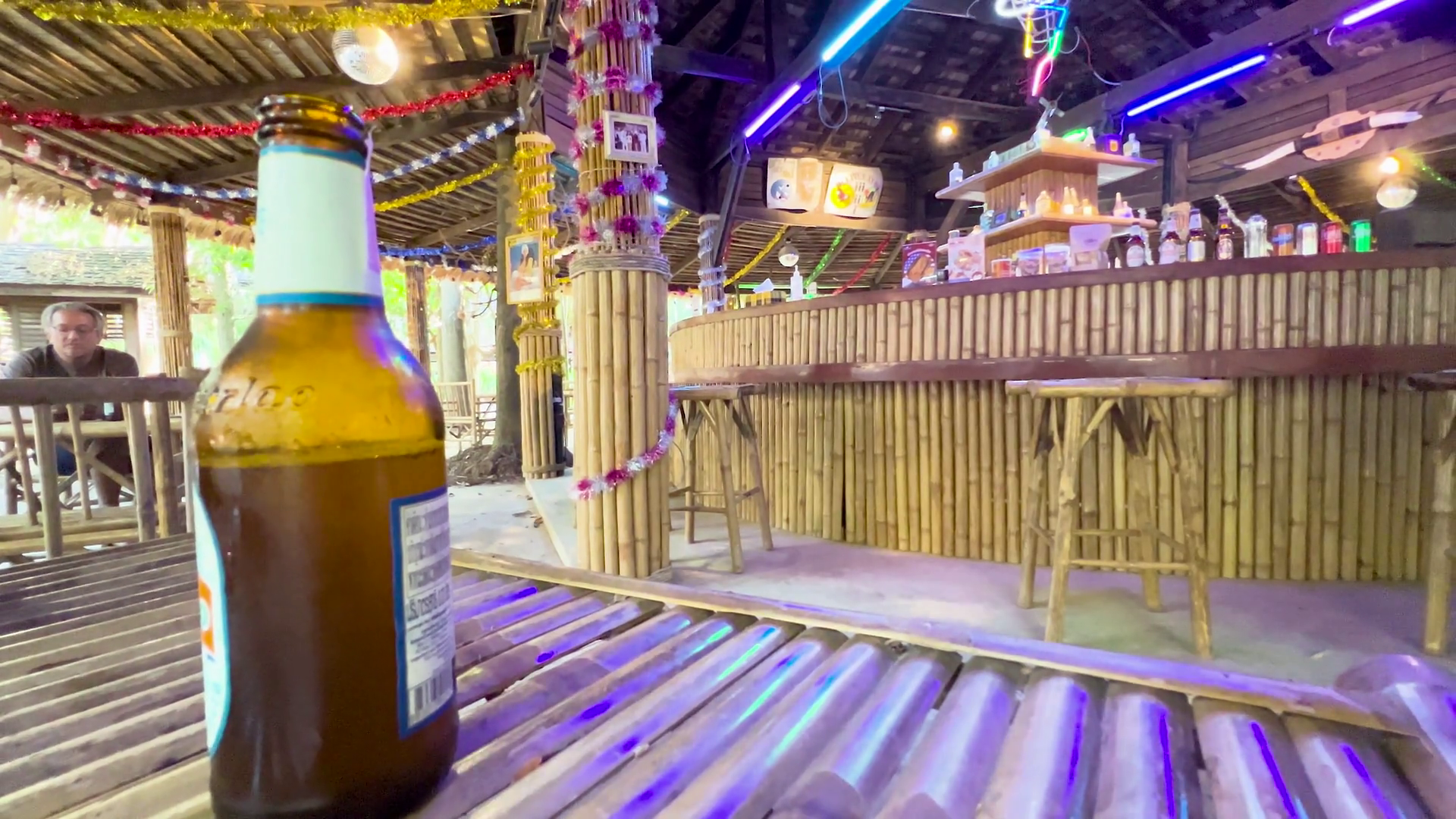 Beer Bottle At Vibrant Thai Restaurant Stock Footage SBV-352757764 ...