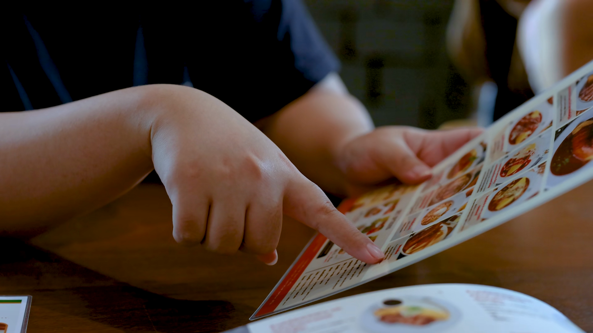 Customer Pointing At Menu Choosing Food In Stock Footage SBV-353691099 ...