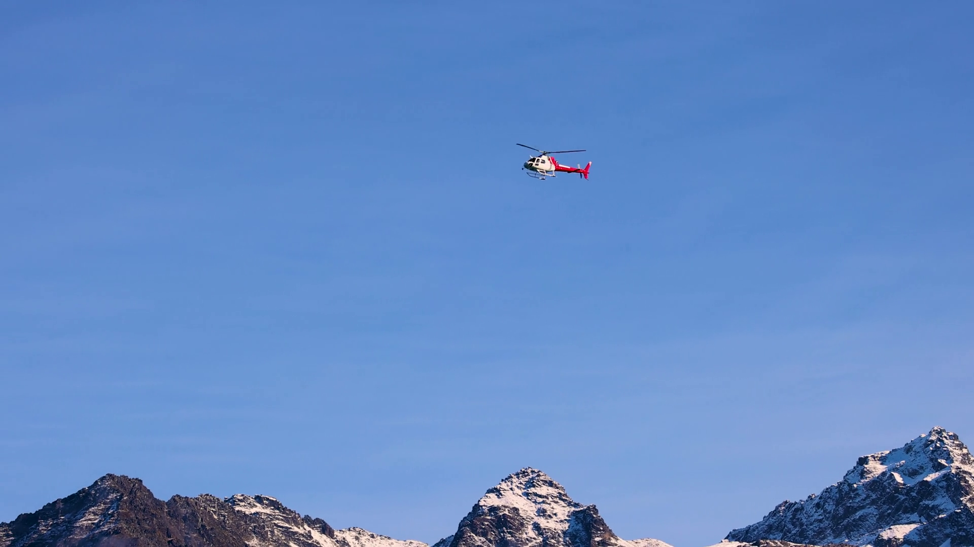 Helicopter Flying Over Snowy Mountains In Stock Footage SBV-352458496 ...