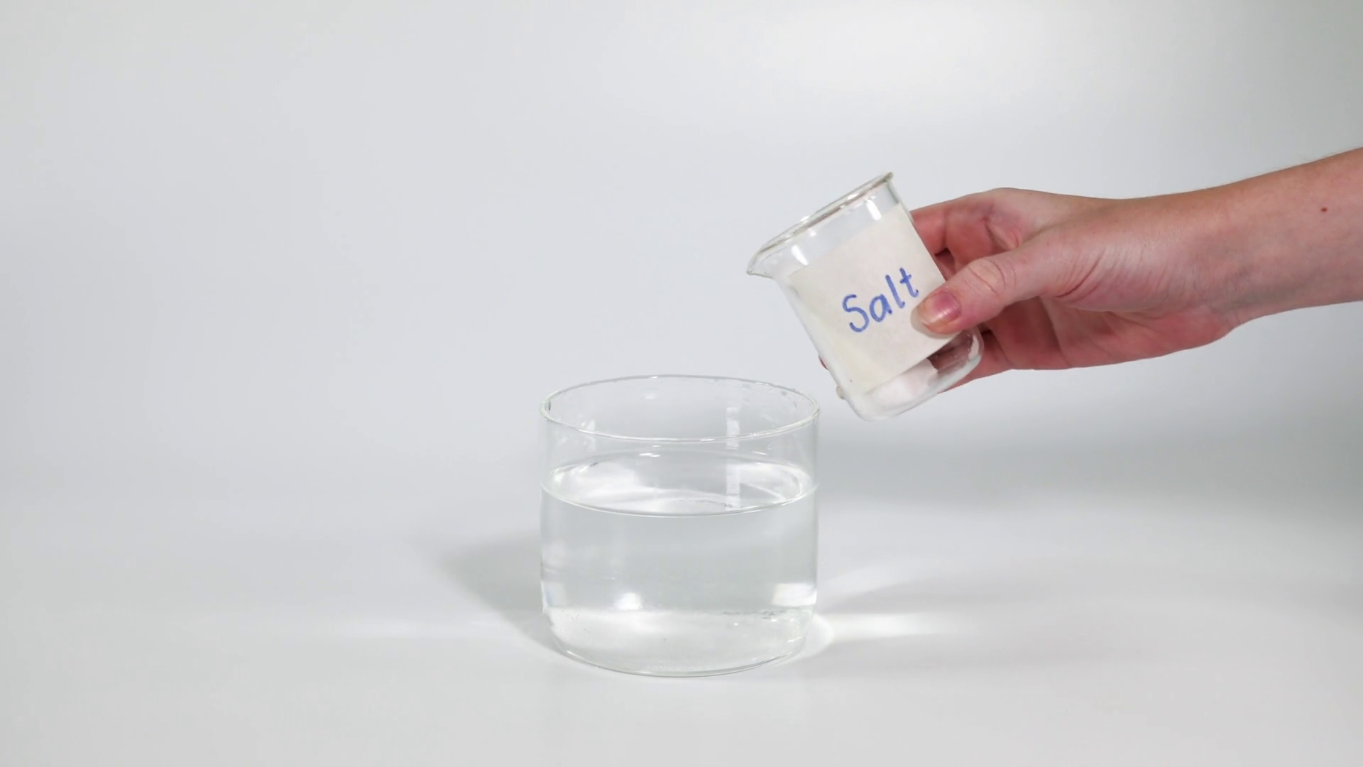 Demonstration Of Salt Dissolving In Water Stock Footage SBV-352973806 ...